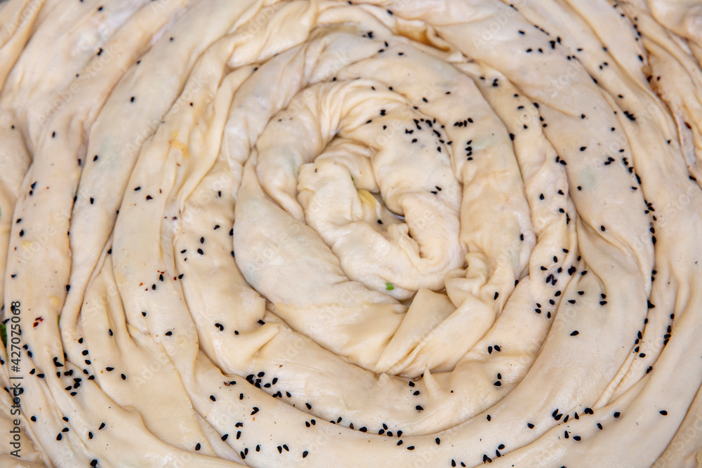 Bosnian borek. Homemade rolled borek, spinach, potato and feta cheese ...