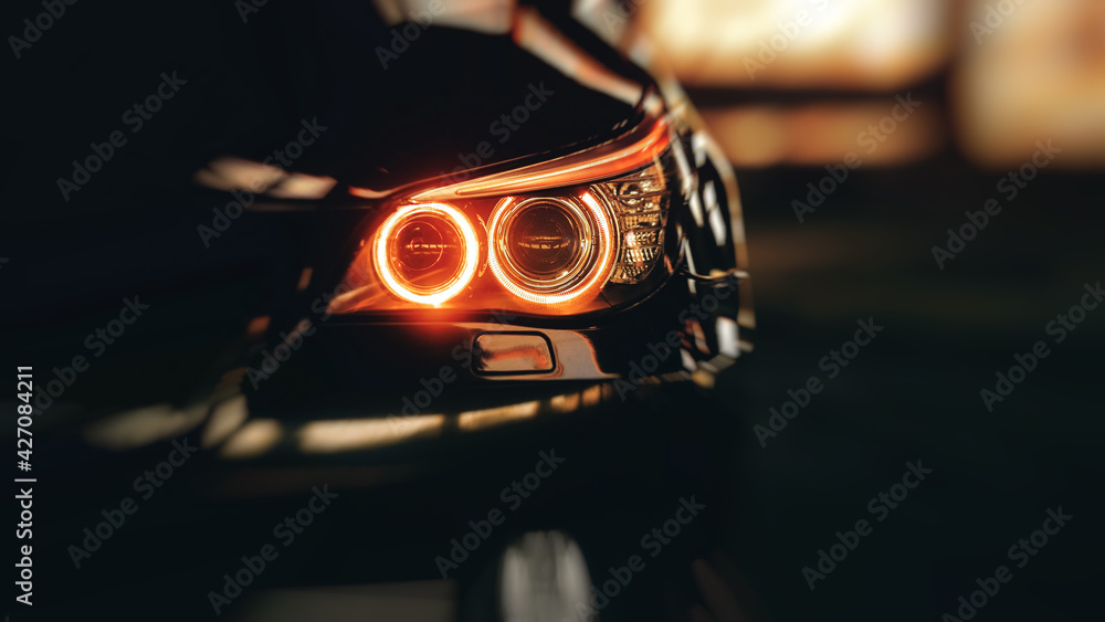 Headlights of black modern car close up. Modern luxury car close-up ...