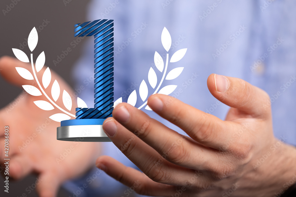 gold winner first place in hand Stock Photo | Adobe Stock