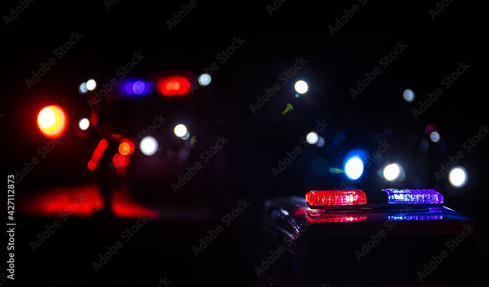 Police cars at night. Police car chasing a car at night with fog ...