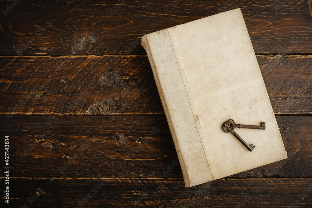 Old books and vintage keys. Books are the key to opening the doors of ...
