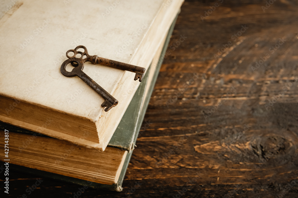 Old books and vintage keys. Books are the key to opening the doors of ...