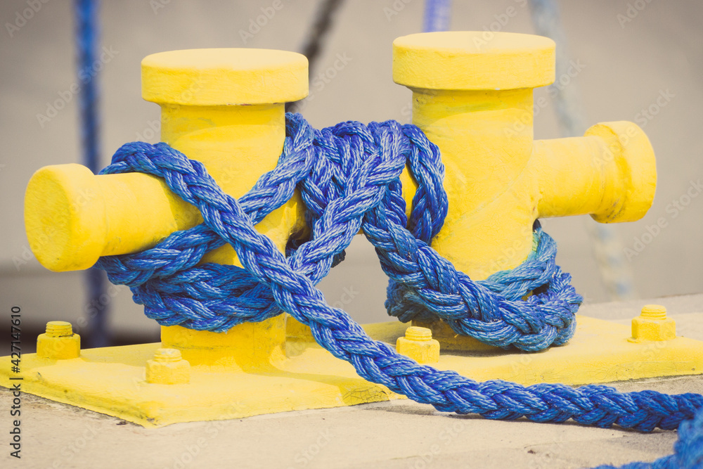 Vintage photo, Blue rope and mooring bollard in port, parts and detail ...