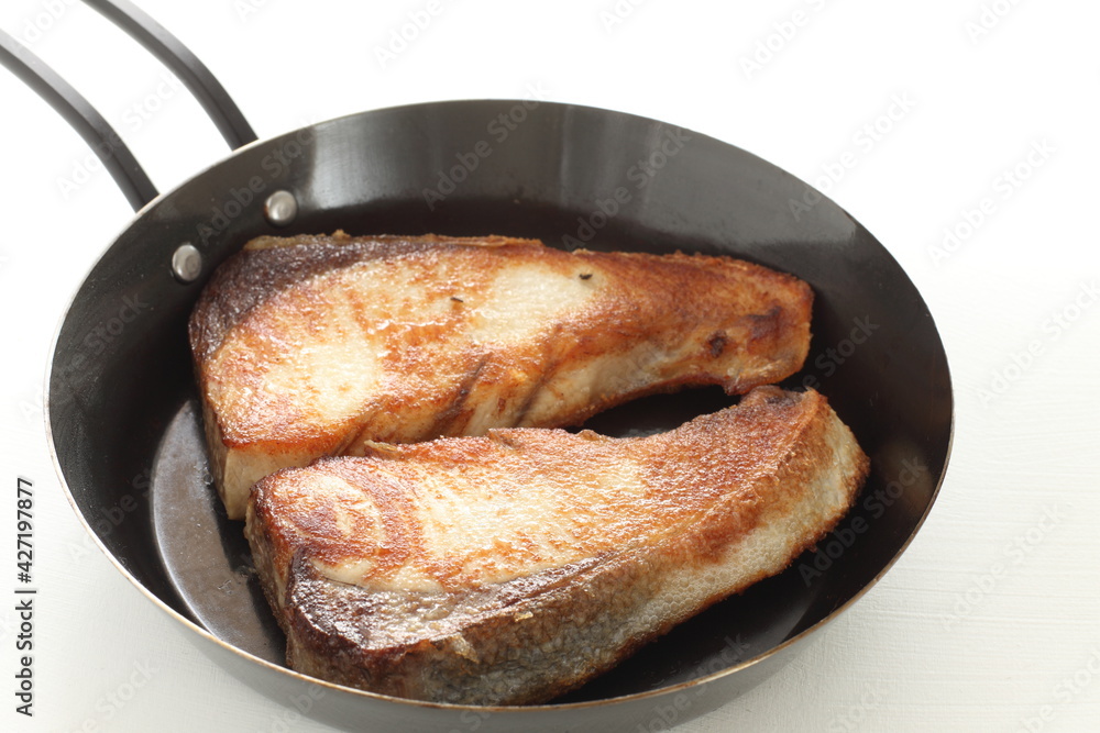 Chinese food, pan fried yellow tail fish fillet on pan Stock Photo ...