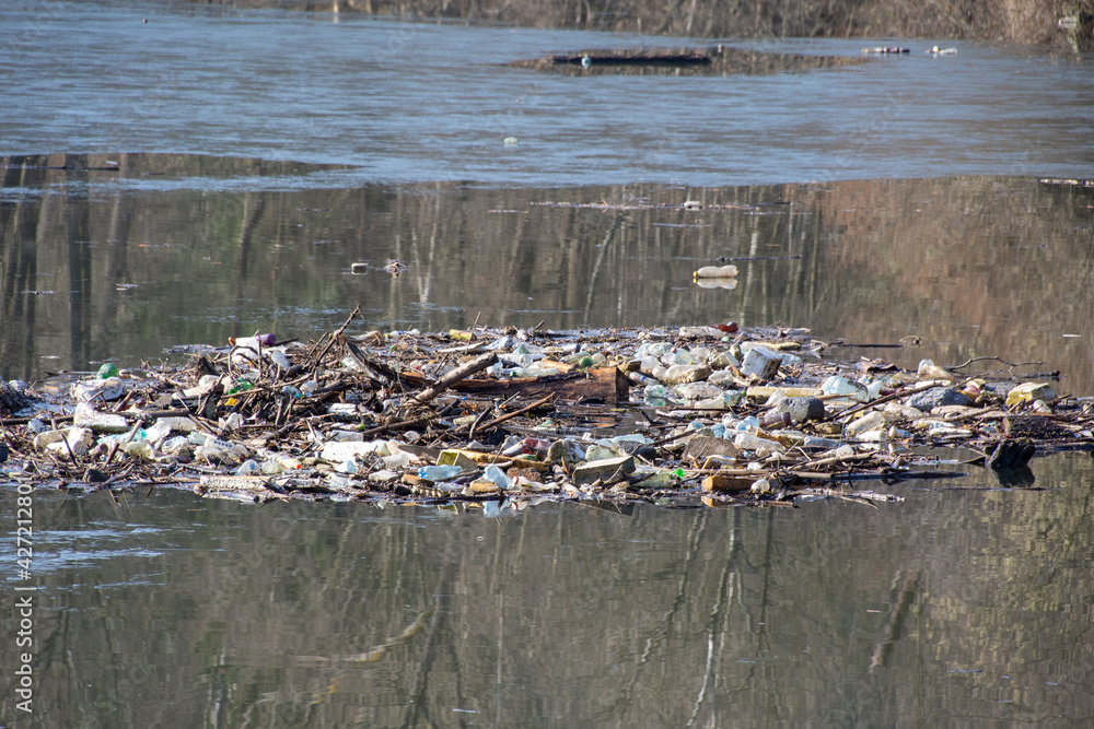 Garbage floating in the water - land water pollution Stock Photo ...