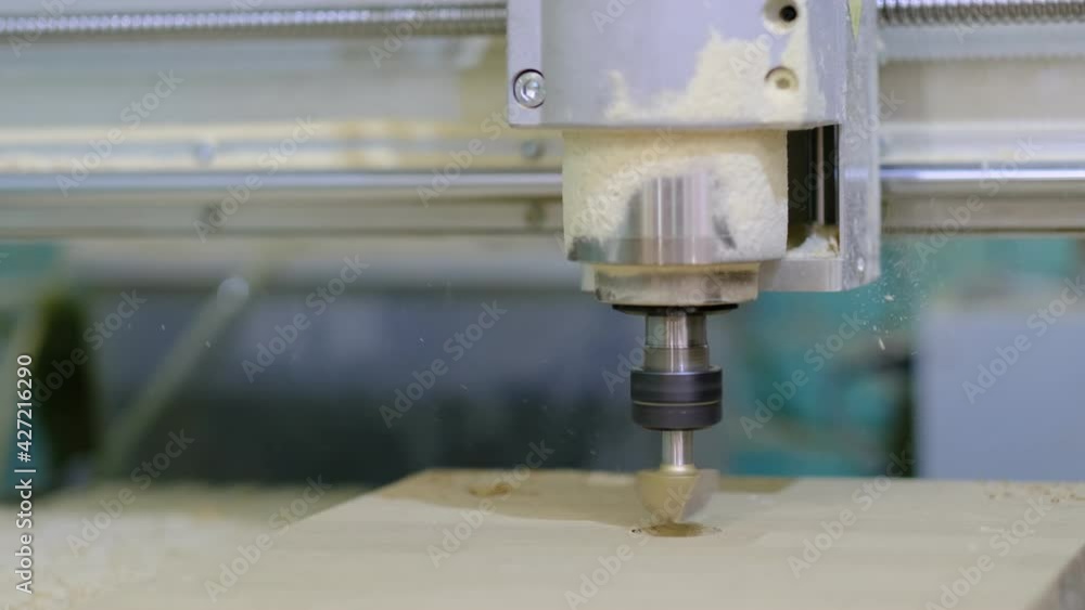Milling a wooden board. Processing of wood panels on CNC coordinate ...