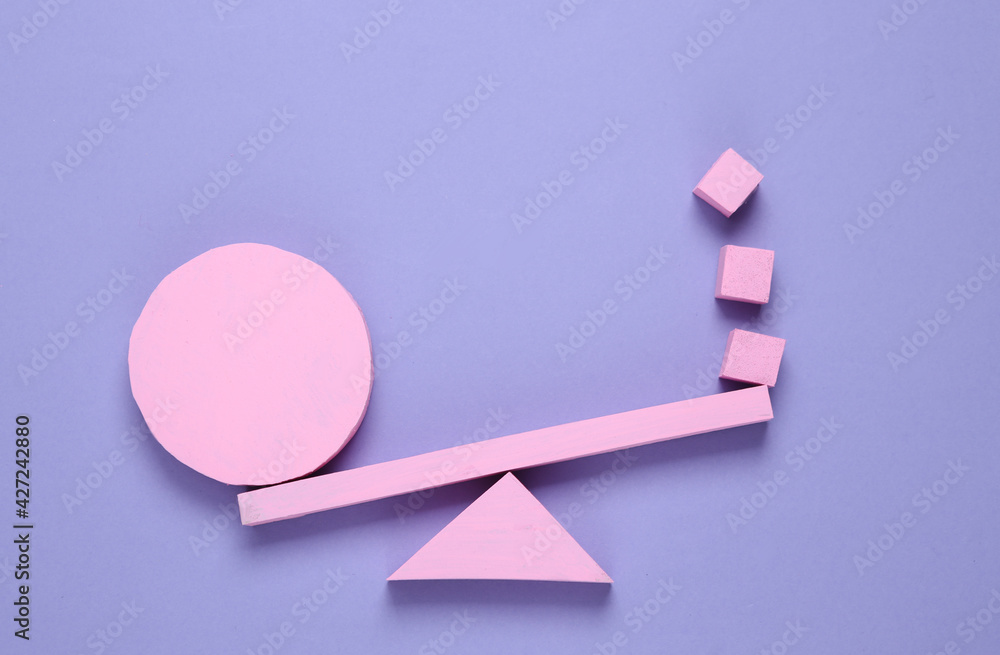 Balancing swing with cube and circle on pink background. Minimalism ...