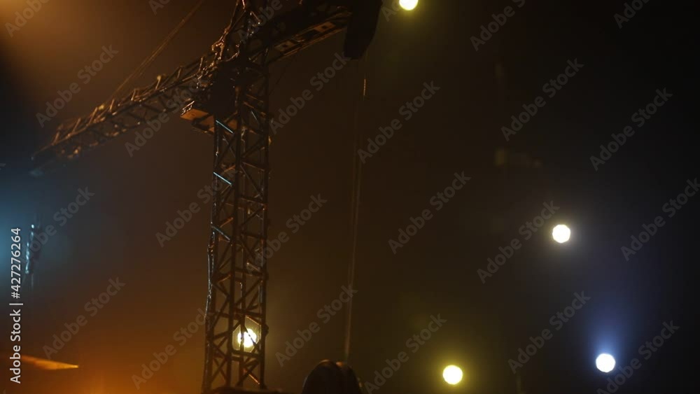 Abstract Industrial background with construction crane silhouette over ...