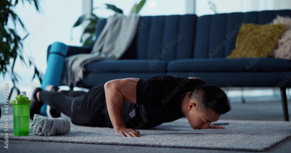 Young Chinese Man in Sports Concentrated Doing Fitness Practice ...