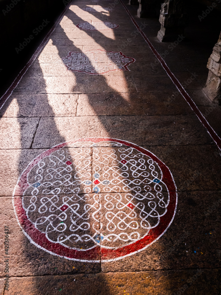Shadows of temple pillars falling on the stone floors of the ancient ...