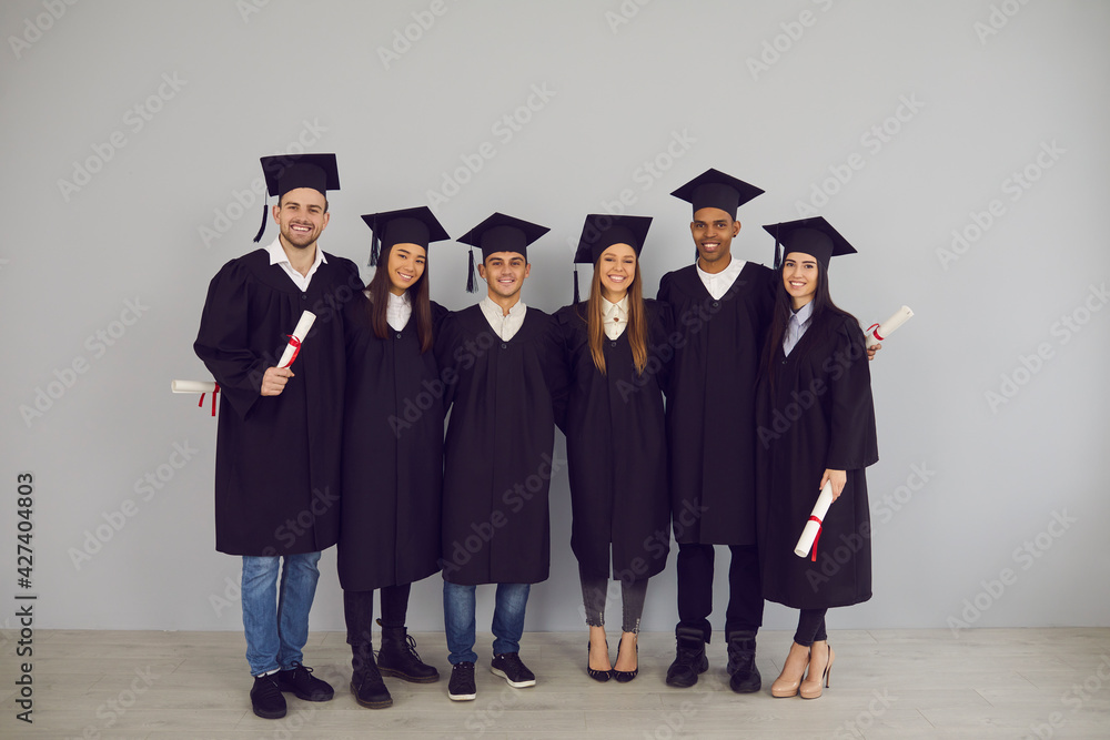 Portrait of a group of successful graduates of different nationalities ...