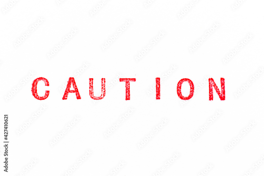 Red color rubber stamp in word caution on white paper background Stock ...