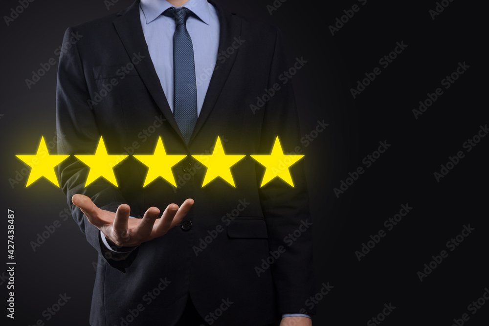 Man hand showing on five star excellent rating.pointing five star ...