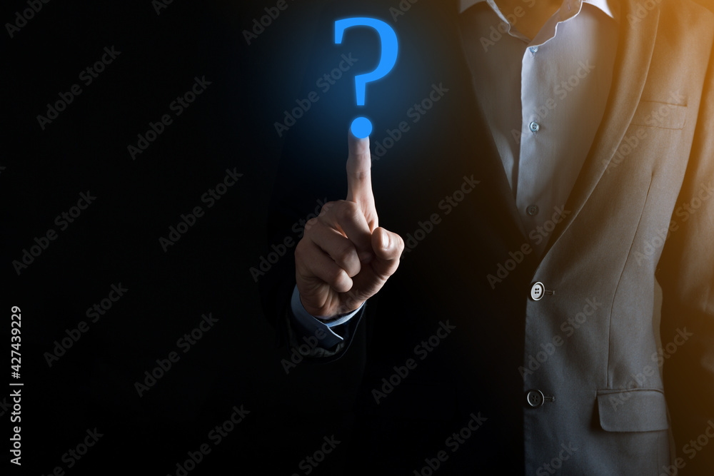 Businessman man hand hold interface question marks sign web. Ask ...