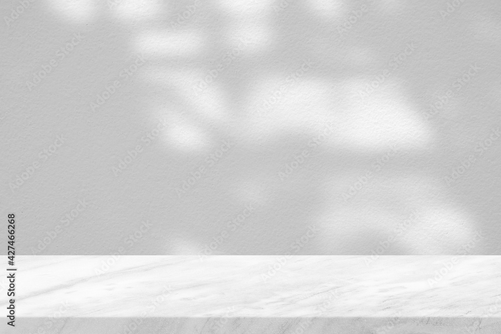 Stockfoto Marble Table with White Stucco Wall Texture Background with ...