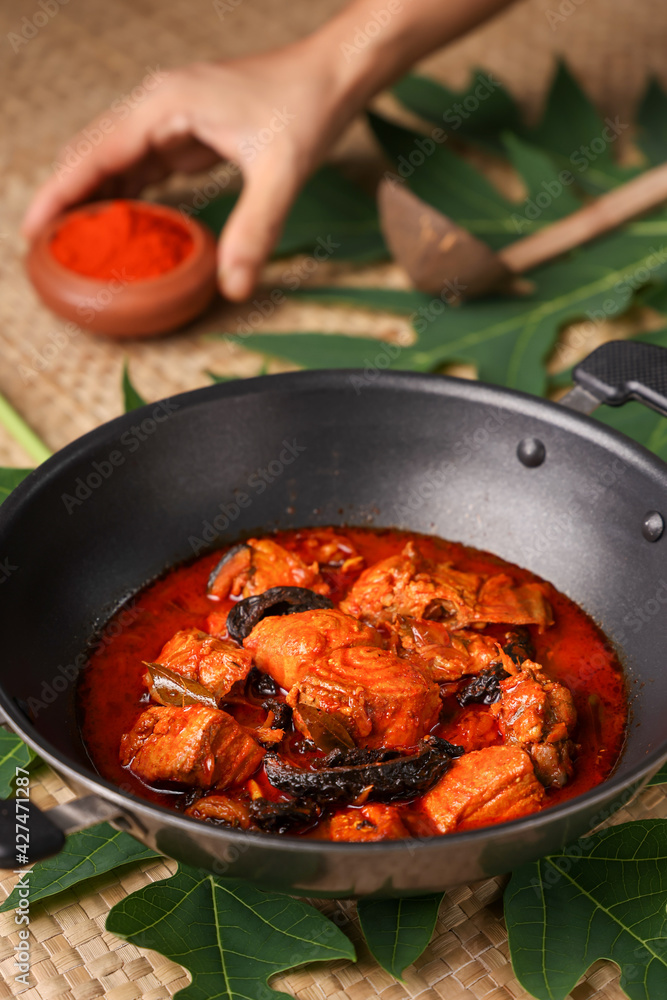 Spicy King fish curry gravy , hand cooking spicy Kerala fish curry fish ...