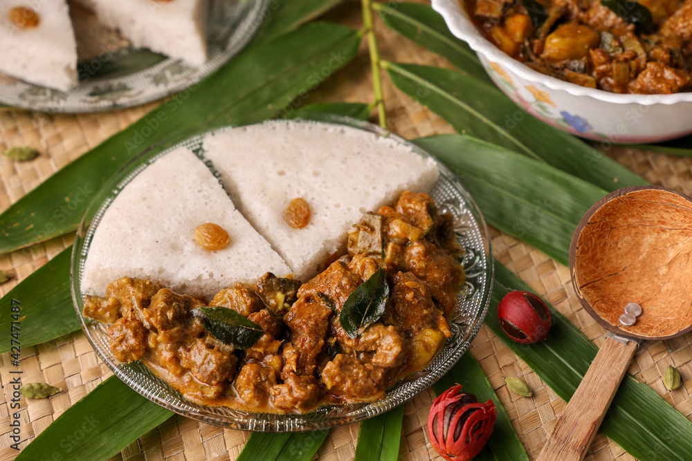 Spicy beef curry and appam Goan style beef vindaloo. Traditional Indian ...