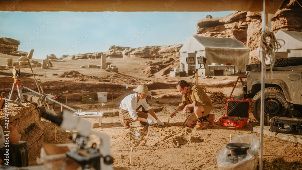 Archeological Digging Site: Two Great Archeologists Work on Excavation ...