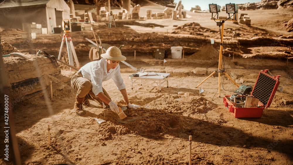 Archaeological Digging Site: Great Female Archeologist Work on ...