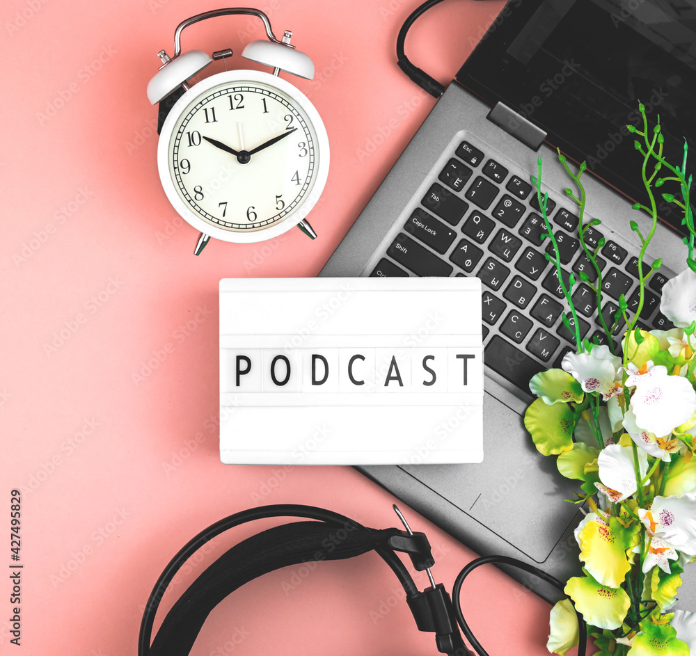 Podcast text on the lightbox, flat lay and creative background for ...