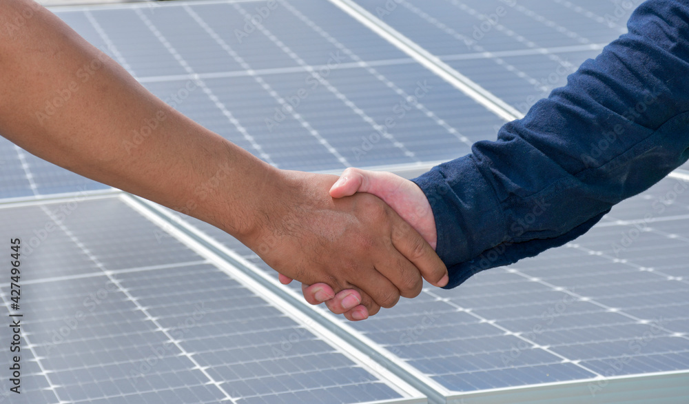 Shaking hands of businessmen and engineers after the conclusion of the ...