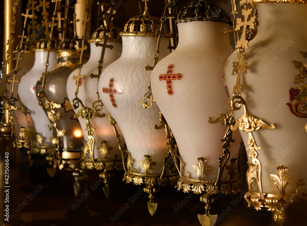 Church of the Holy Sepulchre. Overhead lamps of Chapel of Calvary ...