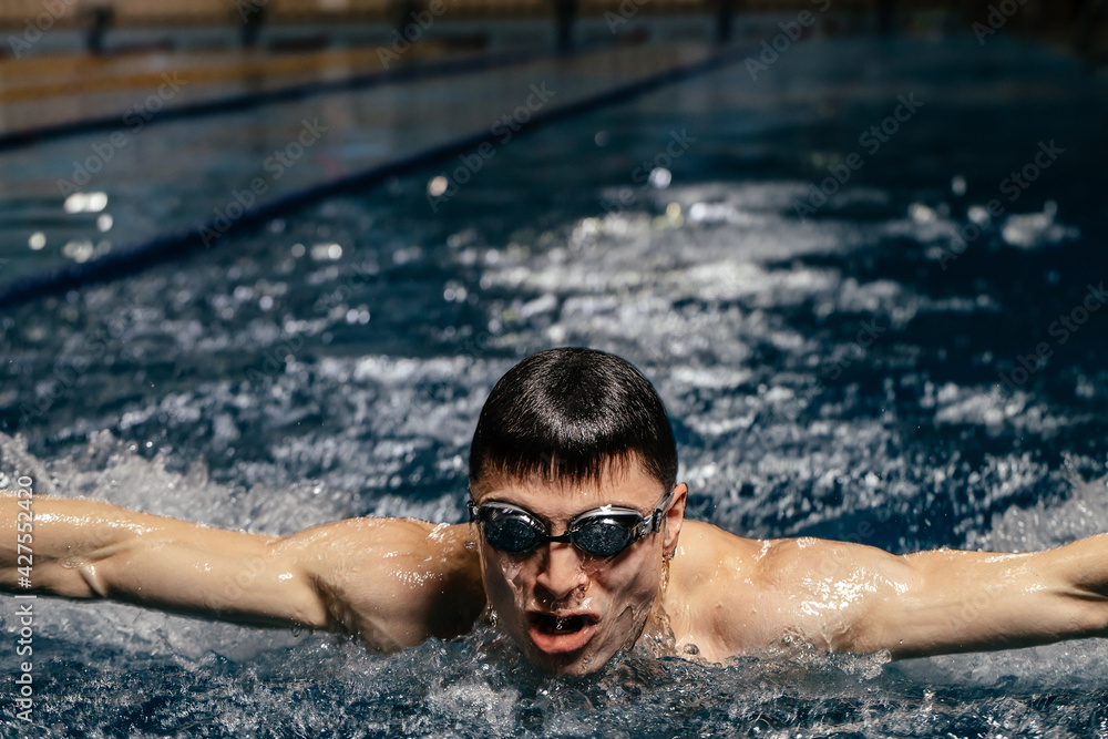 person in swimming pool Stock Photo | Adobe Stock