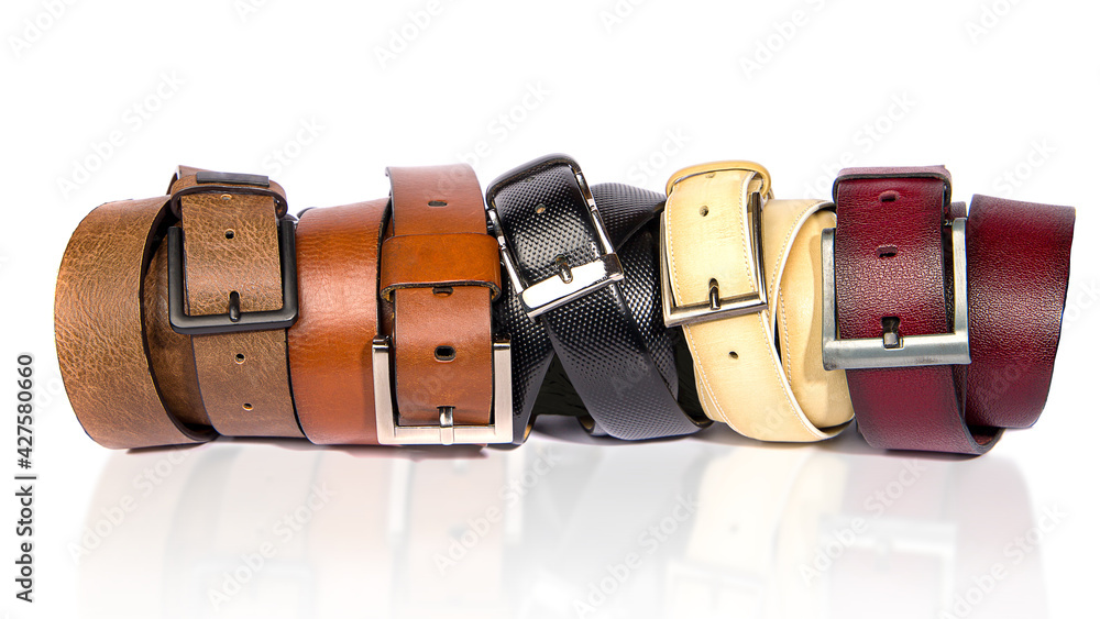 leather belt isolated on white, Many leather belts of different colors ...