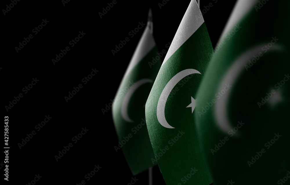 Small national flags of the Pakistan on a black background Stock Photo ...