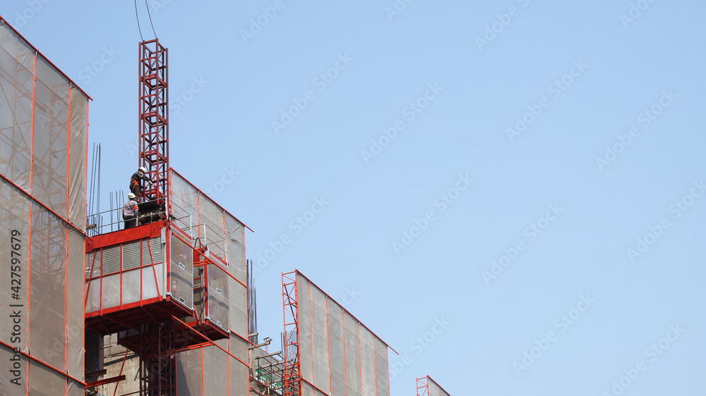 Engineers are installing elevators system, Passenger lift used for ...