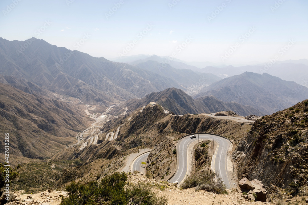 Steep, winding road to the high plateau of Abha in the southeast of ...