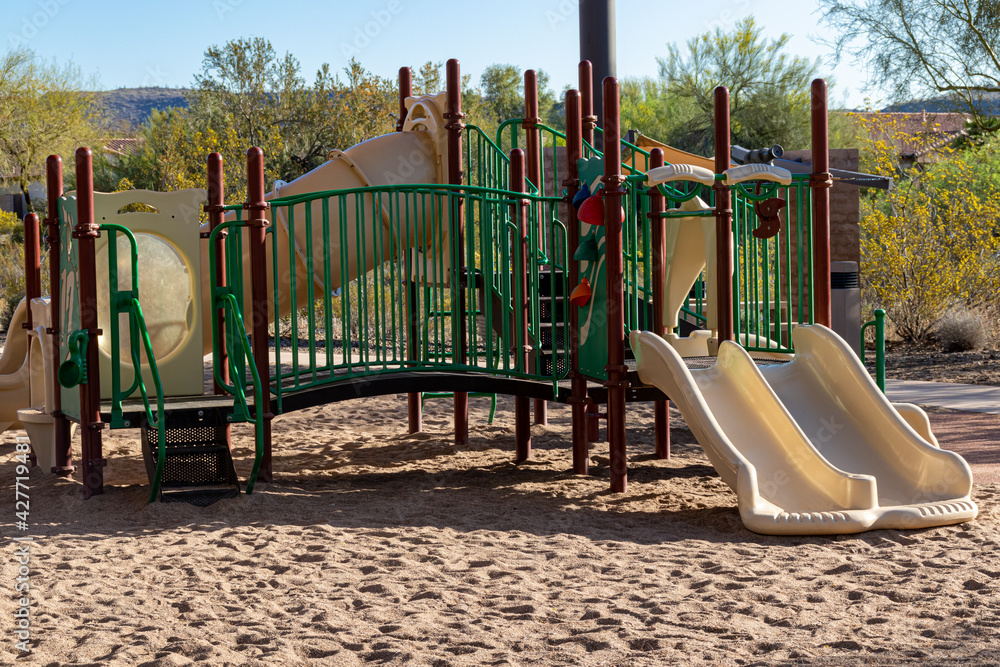 Playground structure with slides, tubes, and climbing Stock Photo ...