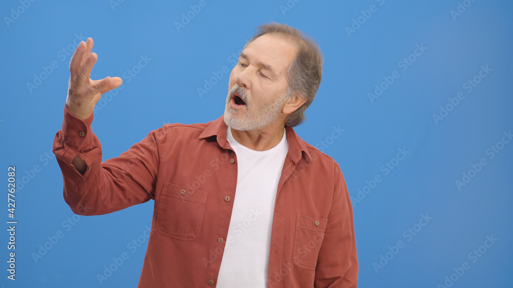 Male mocks the interlocutor showing a hand blah blah blah gesture ...