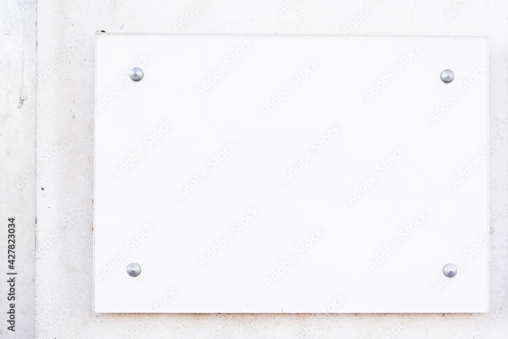 Wall mockup with blank white empty signage plate ready for your artwork ...