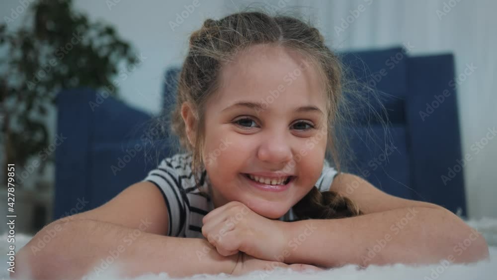 Happy little girl smiling. Close-up of a child face. The girl face with ...