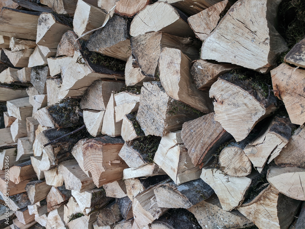 Preparation of firewood for the winter. firewood background, Stacks of ...