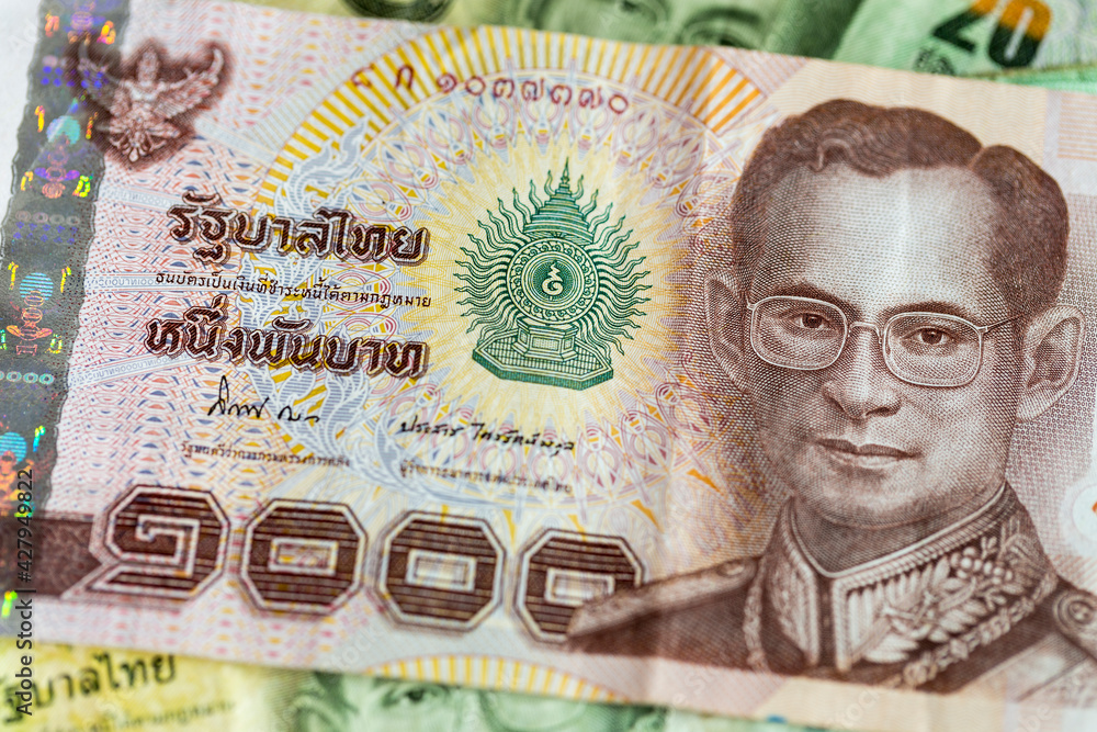 Horizontal closeup of obverse side of one thousand 1000 Thai Baht THB ...