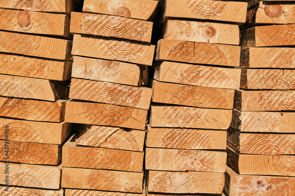 Closeup wooden boards.A pile of boards stacked on top of each other ...