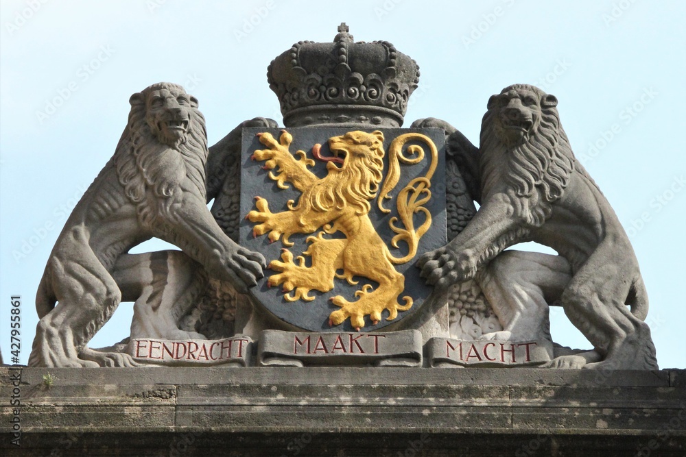 Foto de A powerful stone sculpture of the Belgian coat of arms with a ...
