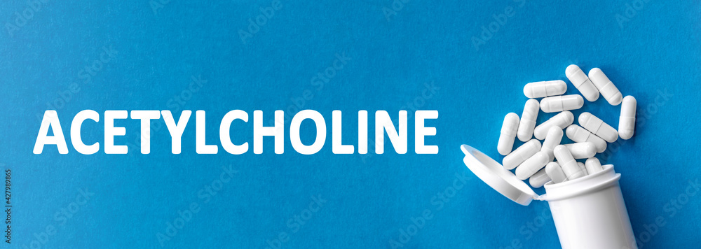 The word ACETYLCHOLINE is written near pills on a light blue background ...