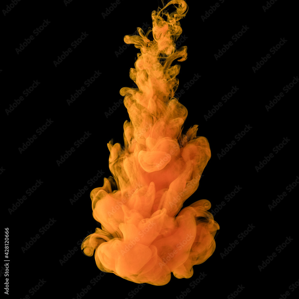 Explosion of colored, fluid and neoned liquids on black studio ...