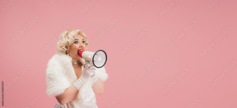 Portrait of young woman in white dress on coral pink background. Female ...