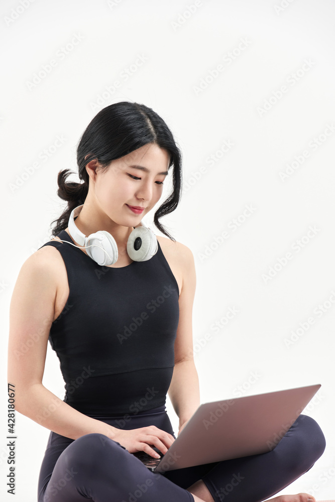 Asia korean girl long haired beautiful pilates or yoga athlete does a ...