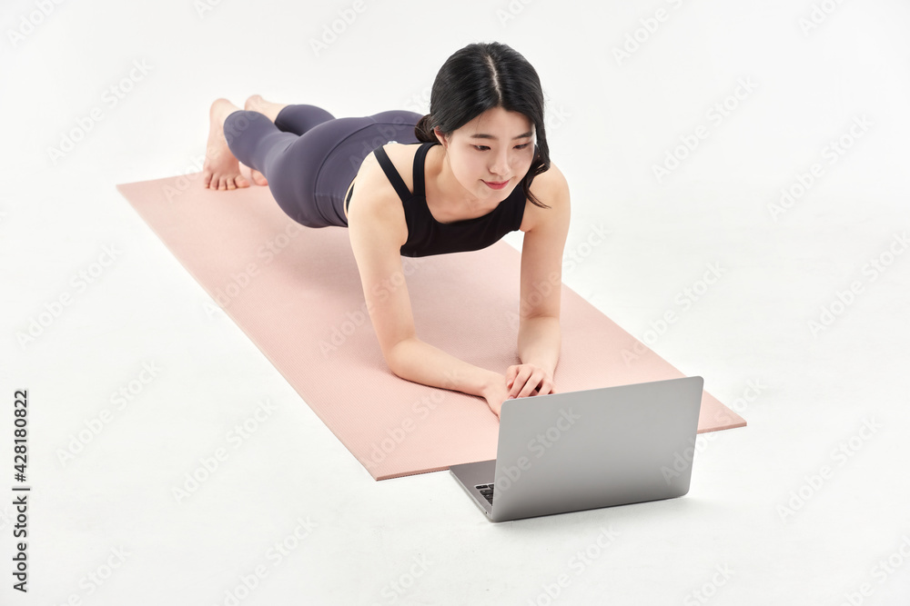 Asia korean girl long haired beautiful pilates or yoga athlete does a ...