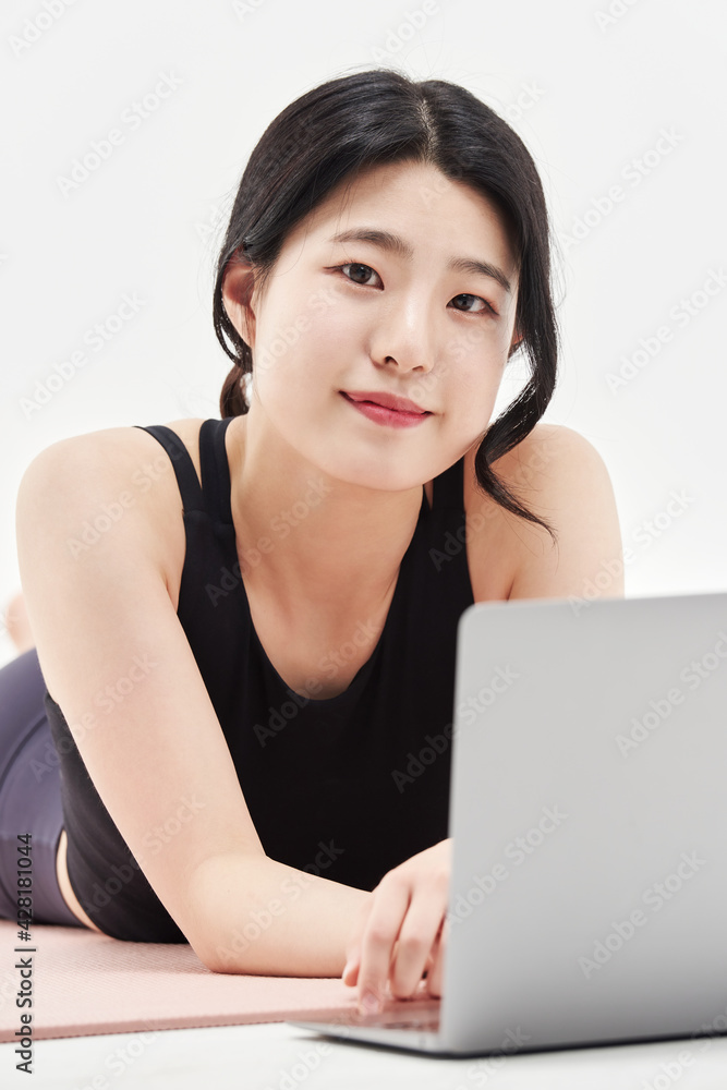 Asia korean girl long haired beautiful pilates or yoga athlete does a ...