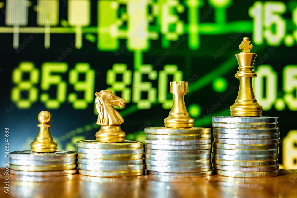 Saving money as a concept. Vintage retro stack of gold coins on the ...