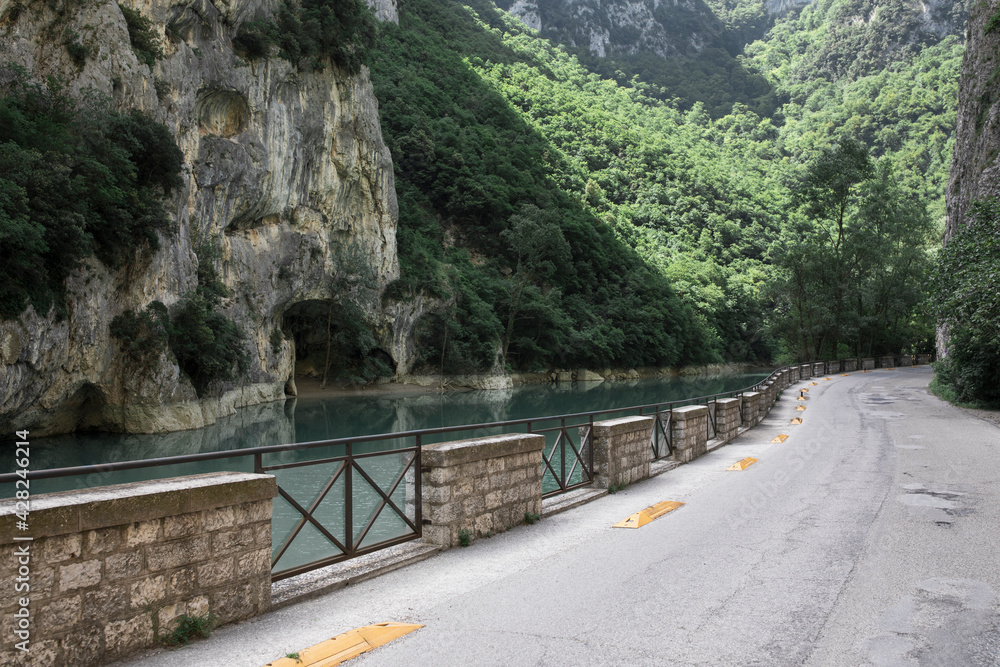 Poster The street that pass through the landscape and unspoiled nature ...