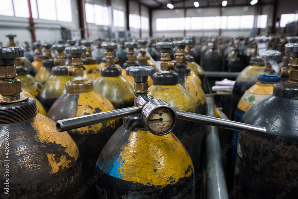 Pressure Tank and Regulator Gauges. Man checking manometer in liquid ...
