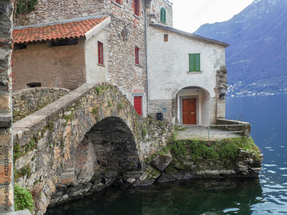 famous stone arch bridge at Como lake.Nesso village,Lombardy,Italy ...