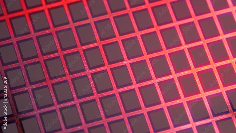 Silicon wafer with semiconductor microchip in red light. Modern ...
